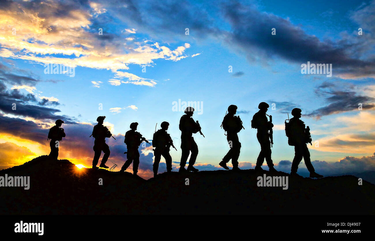 Australian army soldiers with the The Royal Australian Regiment patrol ...