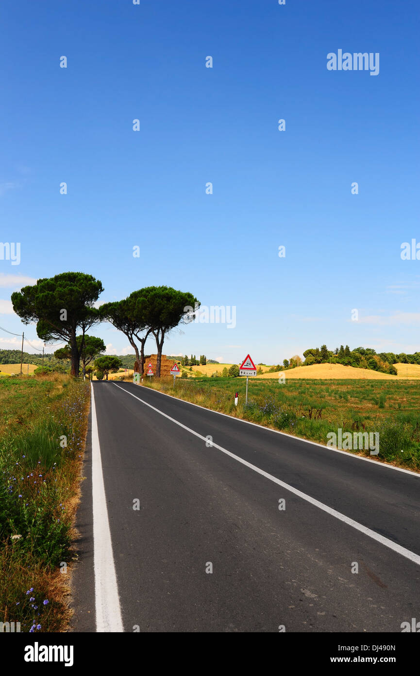 Straight road curve sign hi-res stock photography and images - Alamy