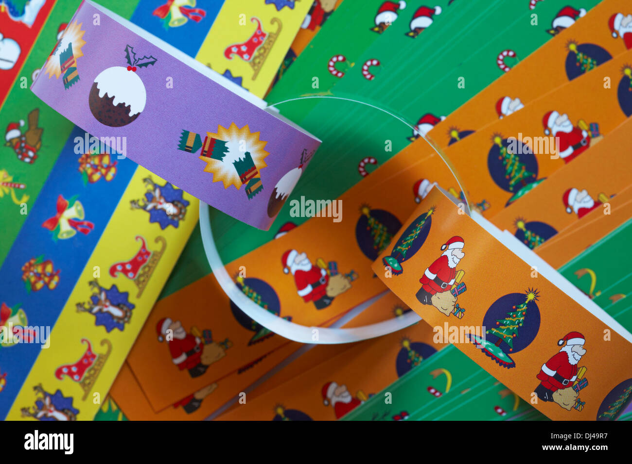 making paper chains decorations for Christmas Stock Photo - Alamy