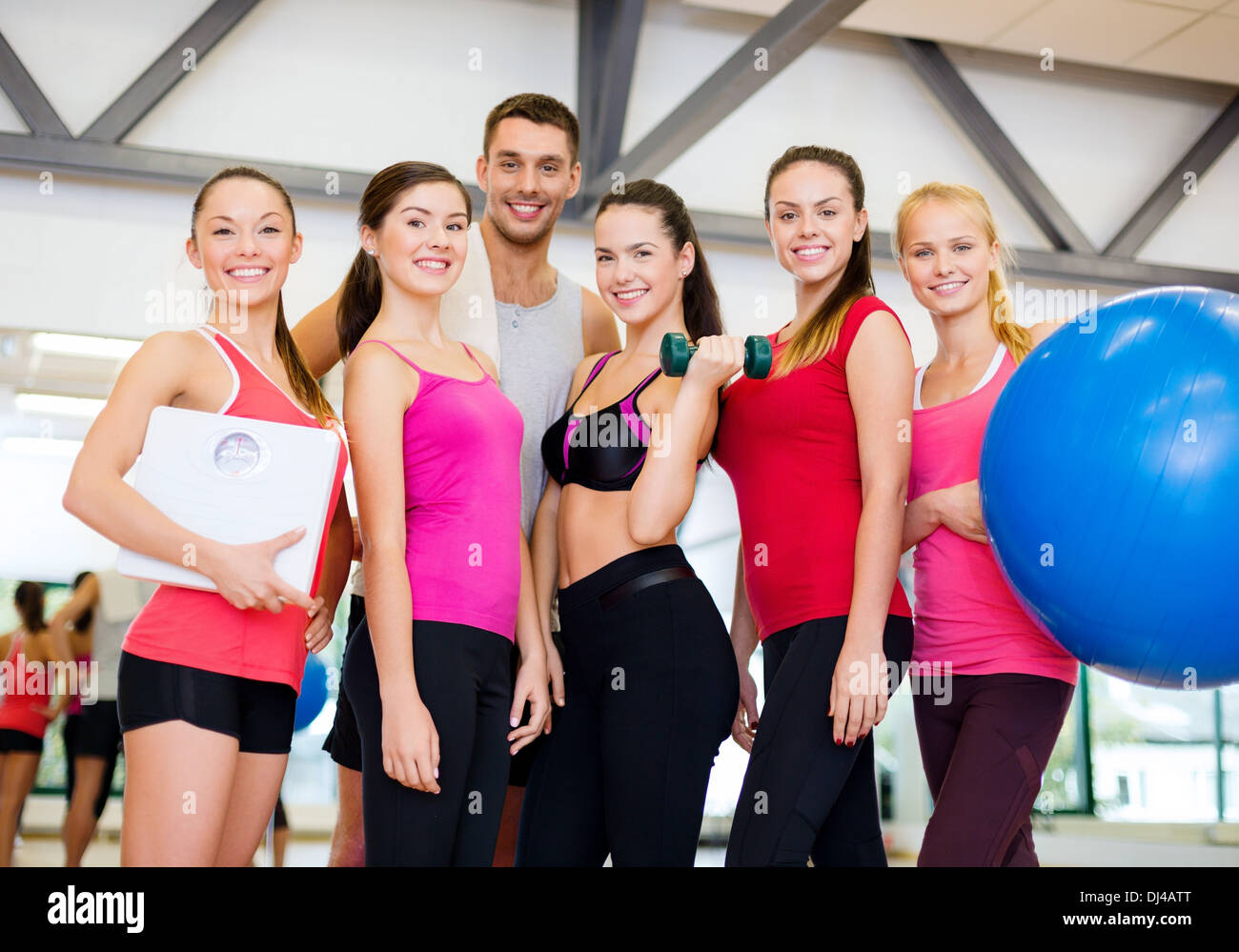 group of smiling people in the gym Stock Photo - Alamy