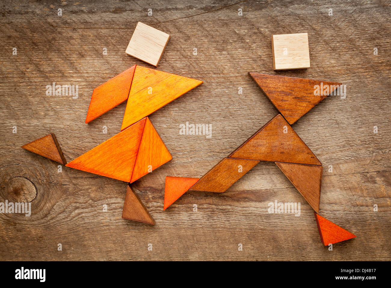 a couple of runners or athletes - abstract figures built from tangram ...
