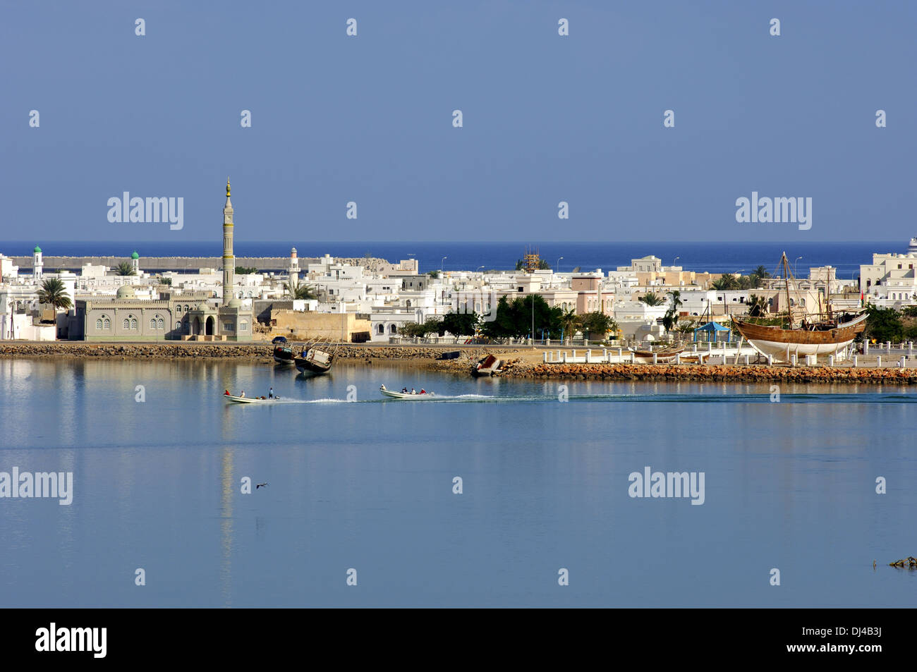 blue lagoon at the harbour town Sur, Oman Stock Photo - Alamy