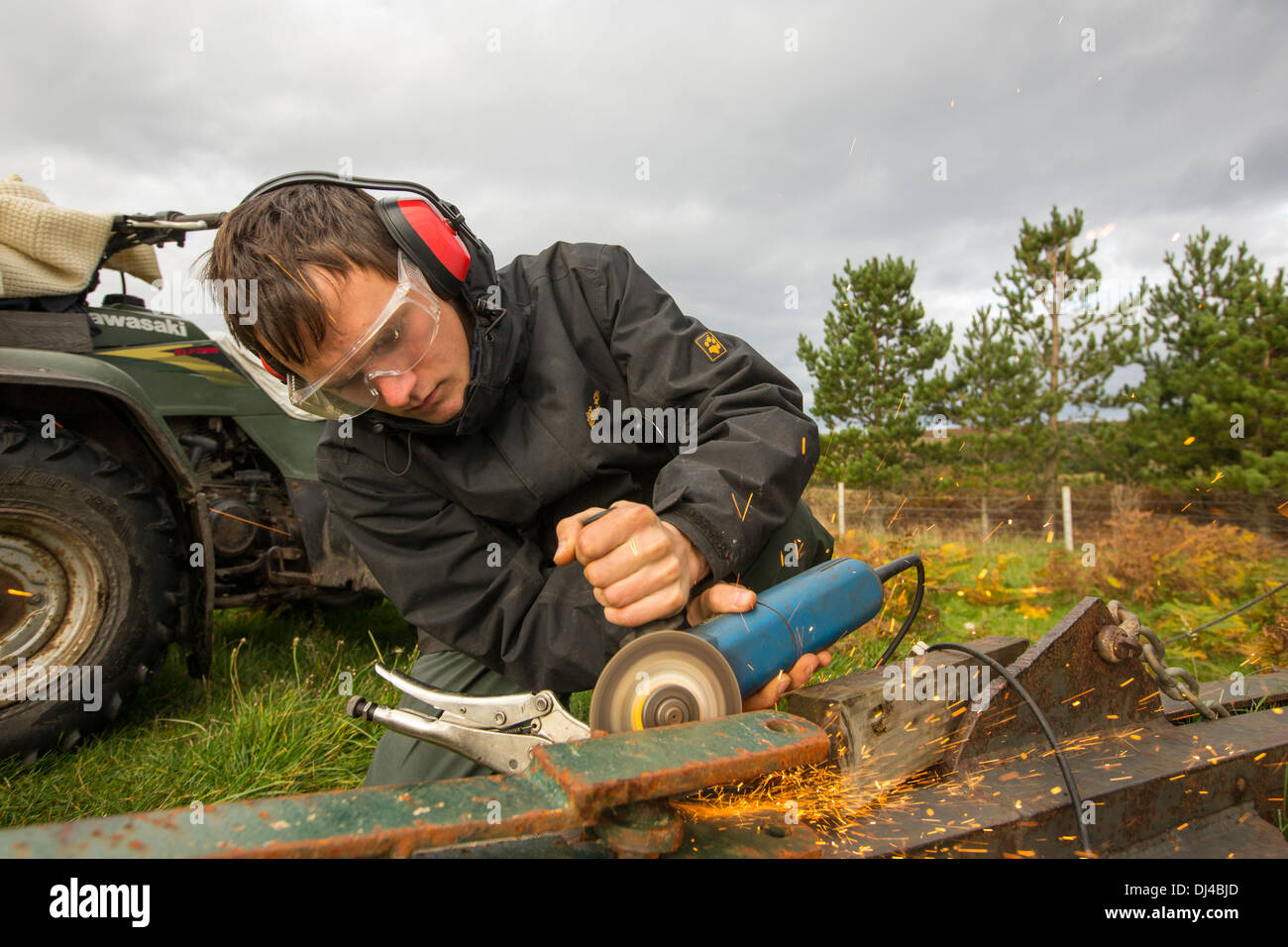 Hugh Piggott doing maintenance on his home made wind turbines in ...