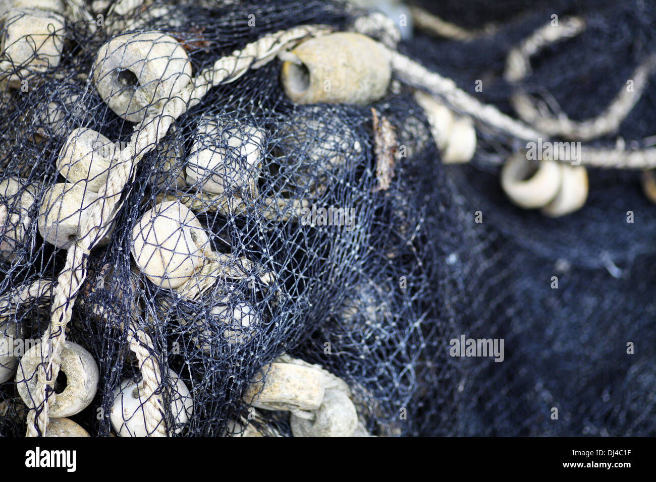 Color detail of an old fishing net Stock Photo - Alamy