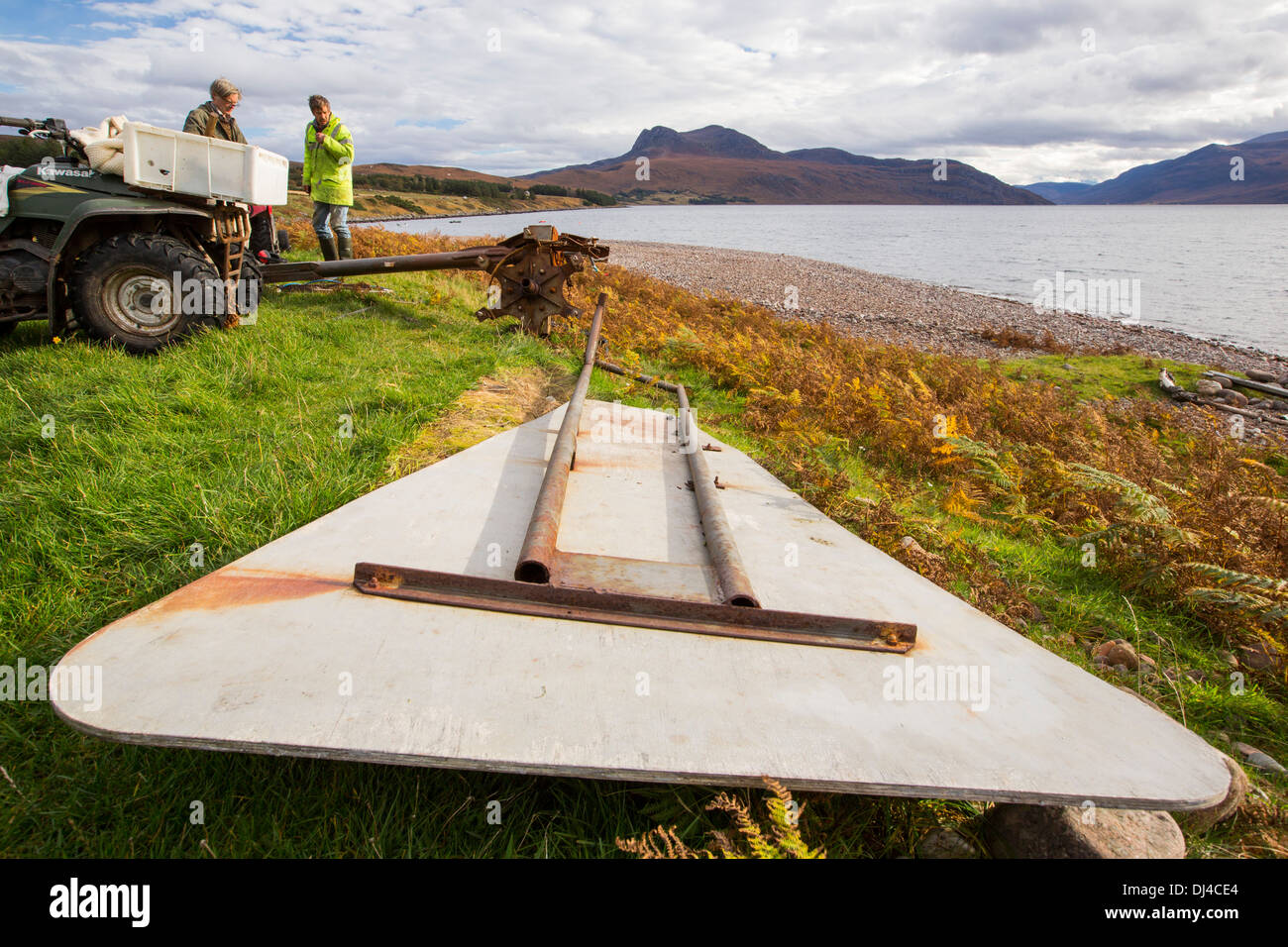 Hugh Piggott doing maintenance on his home made wind turbines in ...