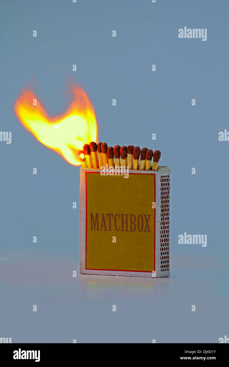 Box of matches with lighted Matchstick Stock Photo - Alamy