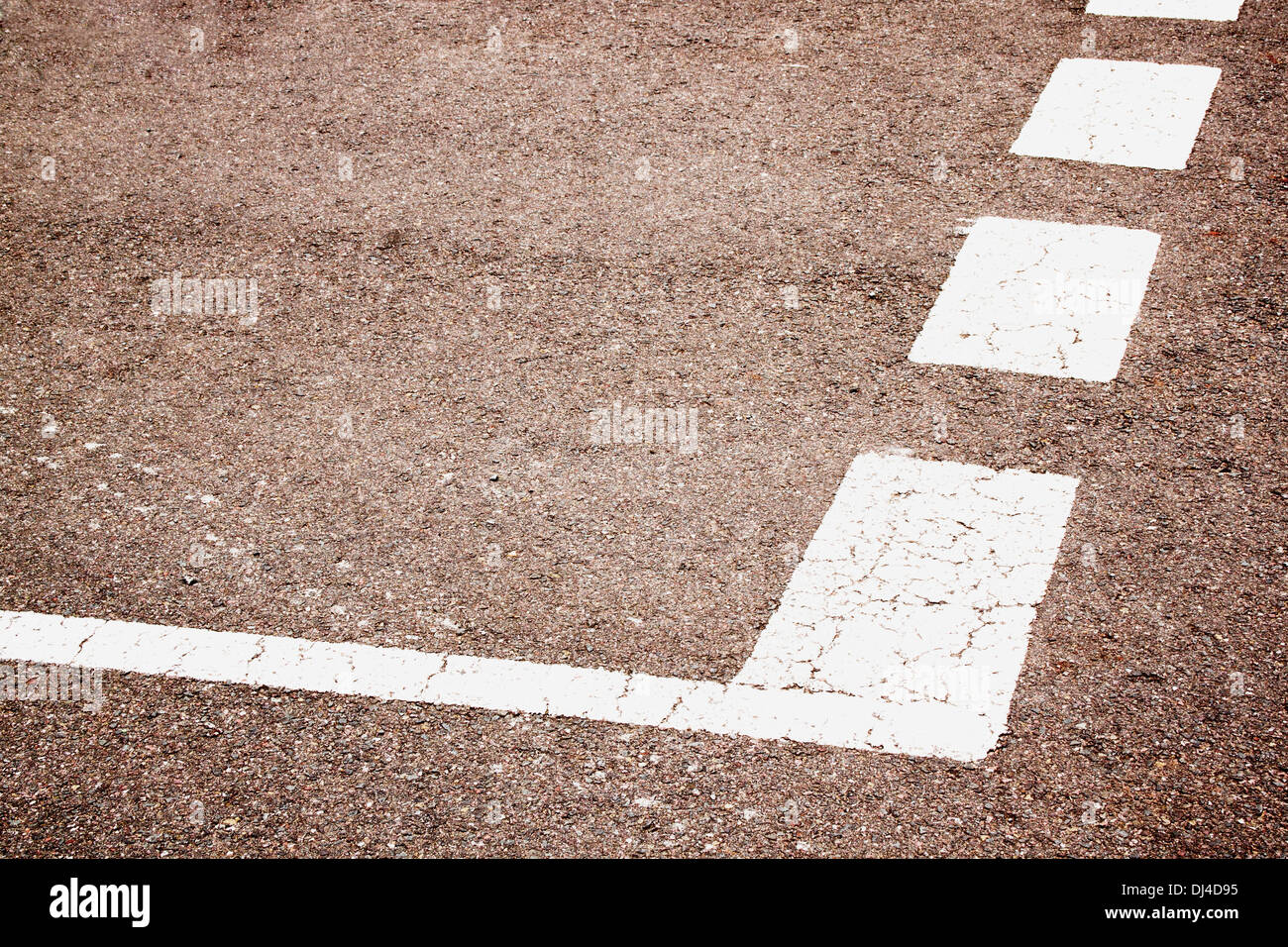 broken white painted lines on roadway depicting yield instruction Stock ...