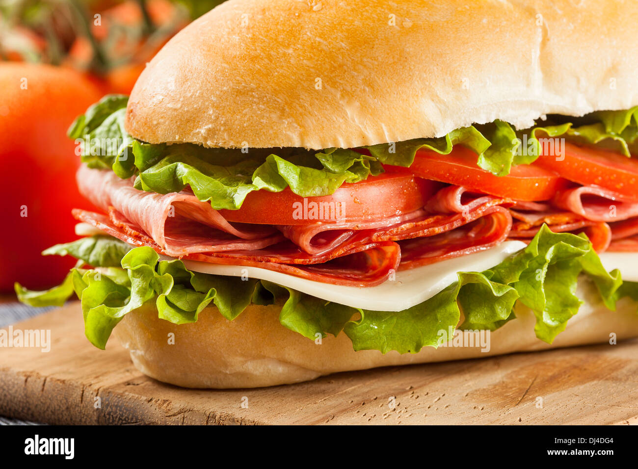 Homemade Italian Sub Sandwich with Salami, Tomato, and Lettuce Stock ...