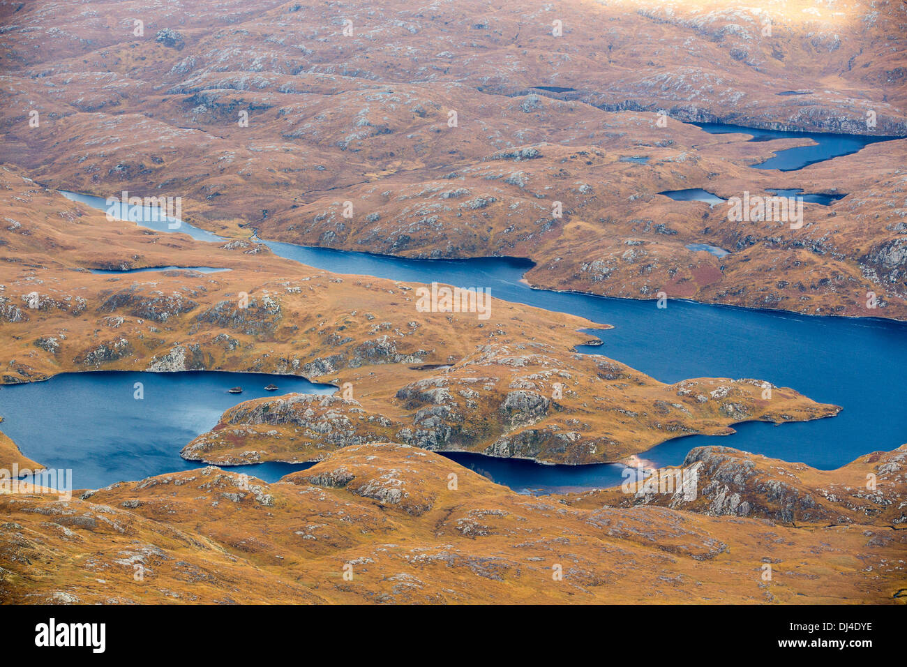 Rugged moorland below Suilven, the most iconic peak of the Assynt ...