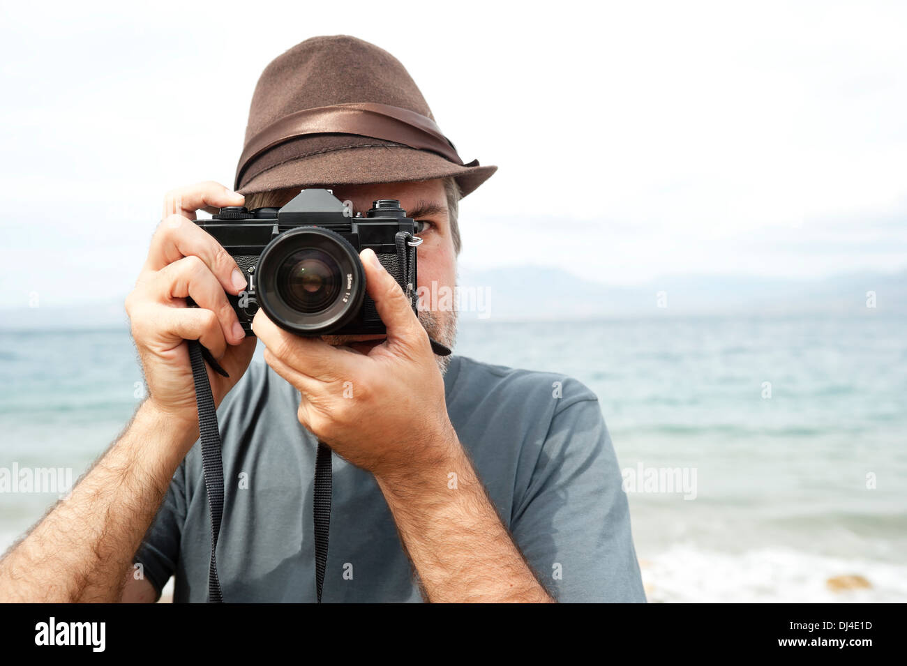 Handsome man vintage camera hi-res stock photography and images - Alamy