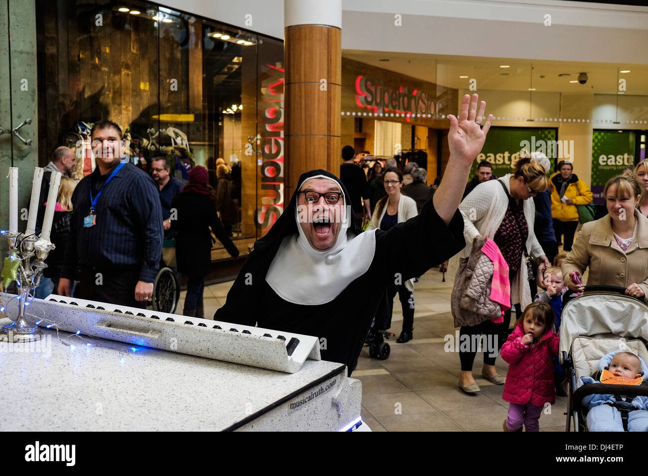 Musical Ruth, a street entertainer performing in a shopping centre in ...