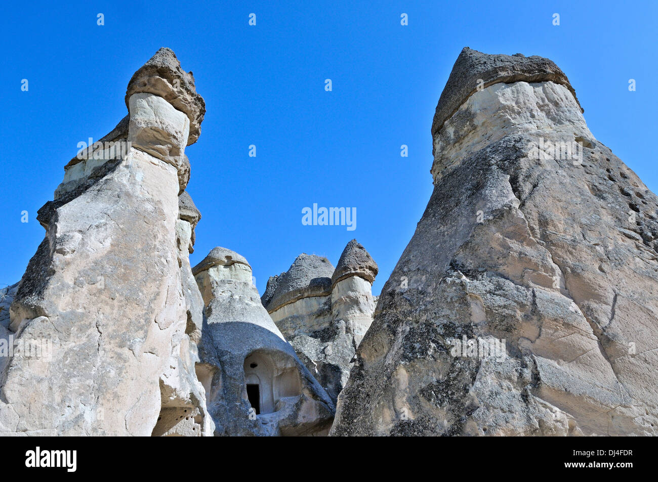 Fairy Chimneys with rock church Turkey Stock Photo - Alamy