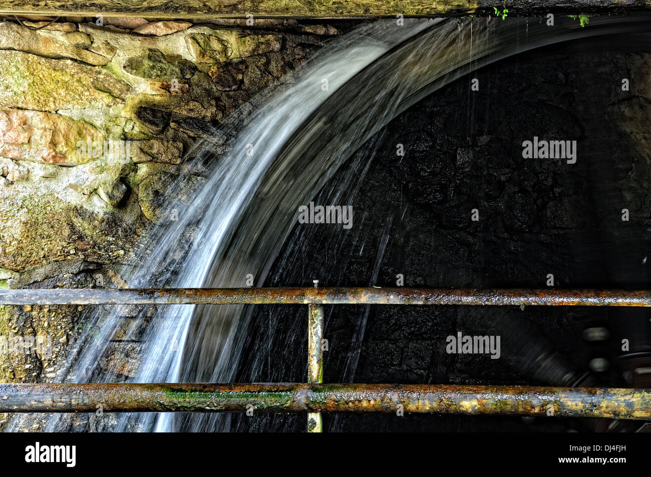 The mill wheel turning Stock Photo - Alamy