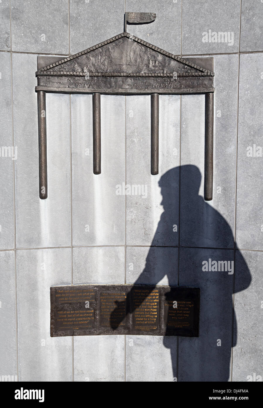 Shadow of statue of John F. Kennedy on quayside at New Ross, Co ...