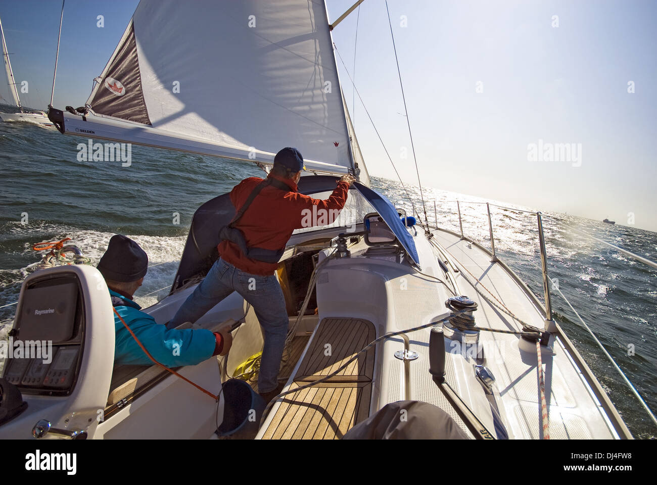 2 men on a sailing yacht Stock Photo - Alamy