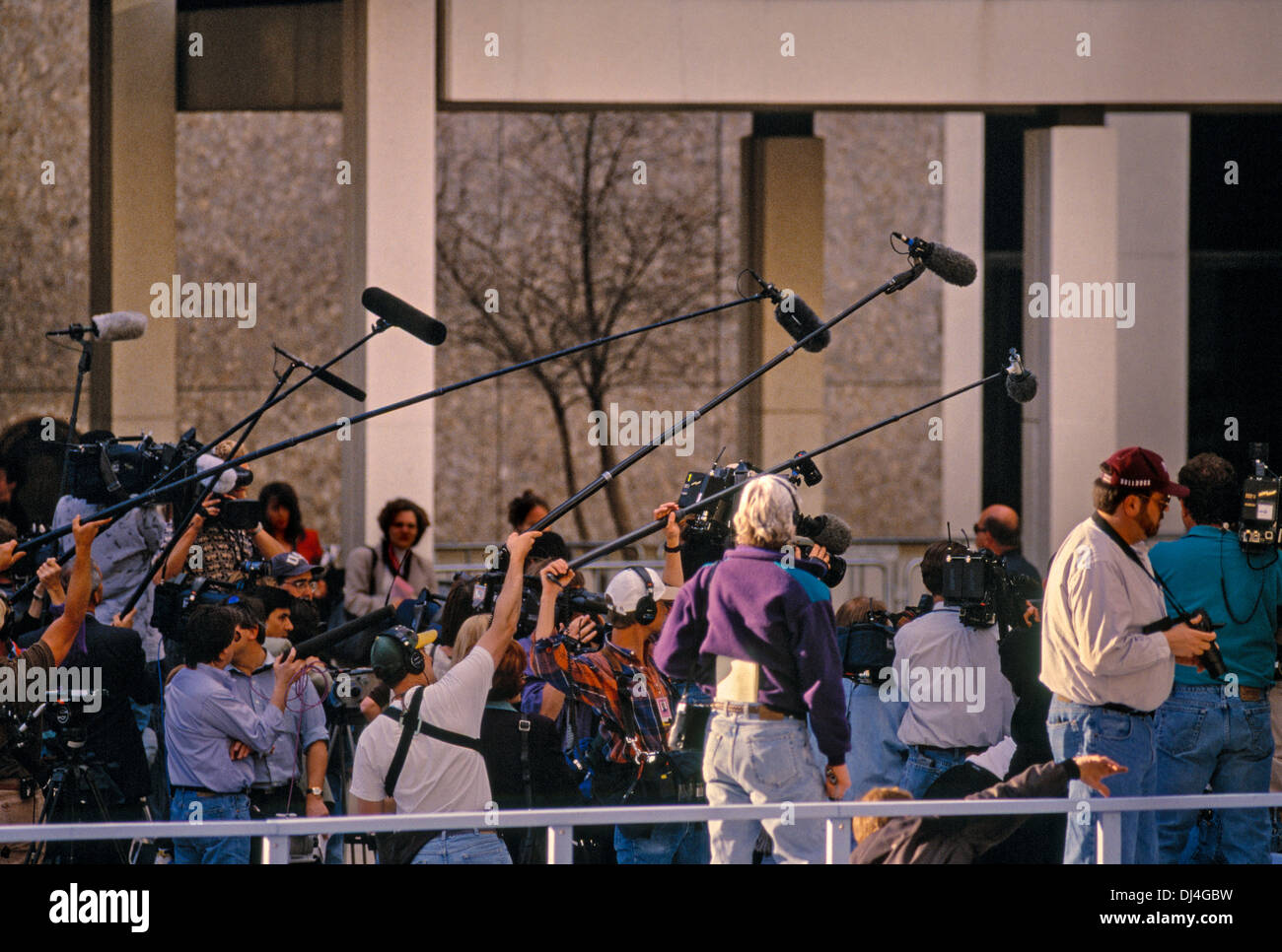 Reporters swarm hi-res stock photography and images - Alamy