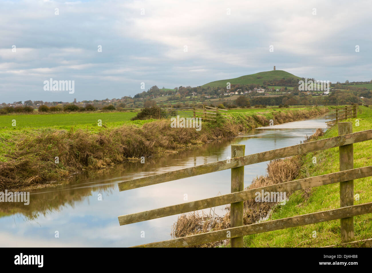 Evening light on the River Brue and the distant Glastonbury Tor ...