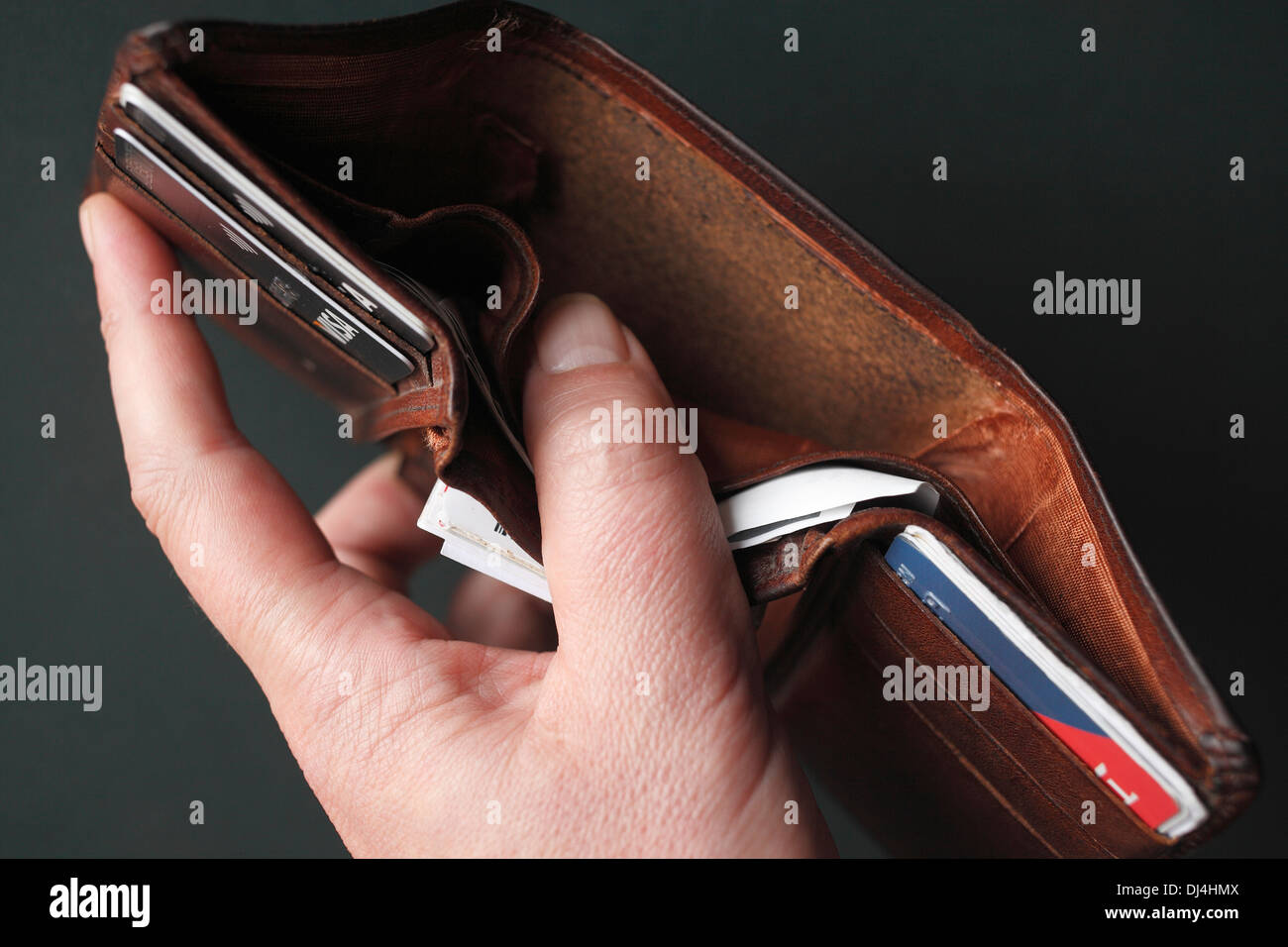 Mans hand holding empty threadbare hi-res stock photography and images ...