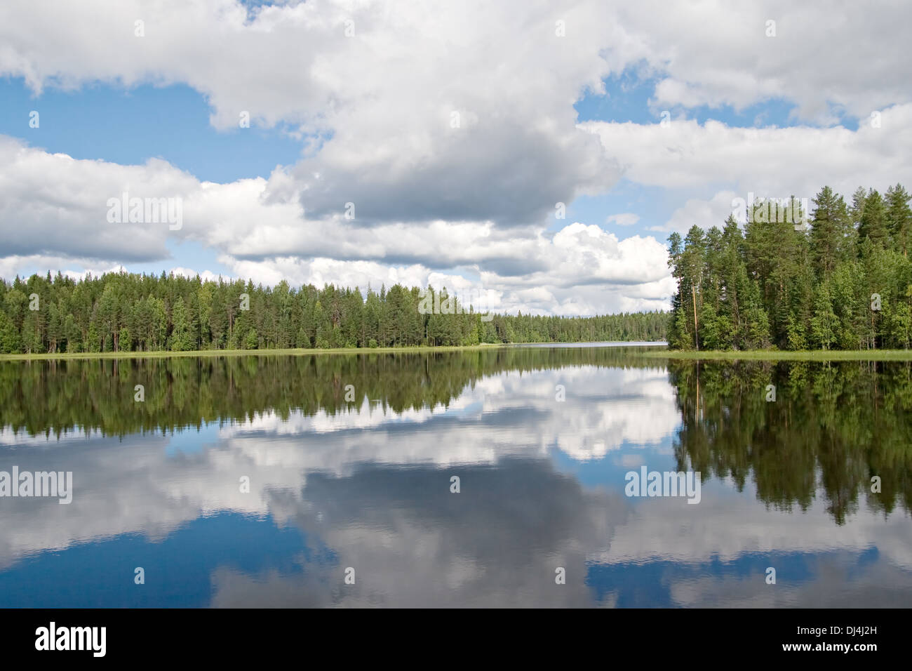 Landscape of Karelian lake and sky with clouds Stock Photo - Alamy