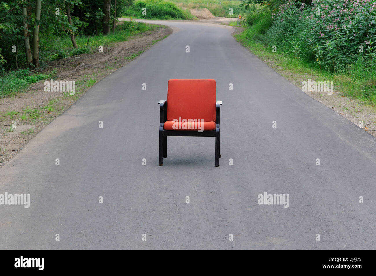 Red Chair in the Street Stock Photo - Alamy
