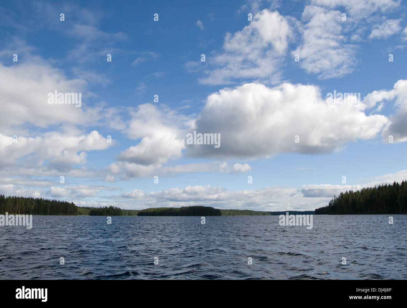 Landscape of Karelian lake and sky with clouds Stock Photo - Alamy