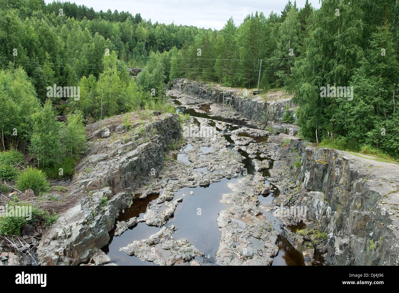 Rocky riverbed dried after dam construction Stock Photo - Alamy