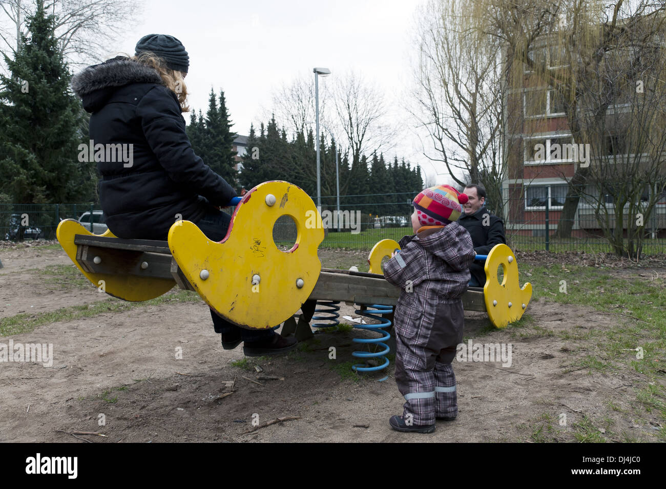 Man watching child playground hi-res stock photography and images - Alamy