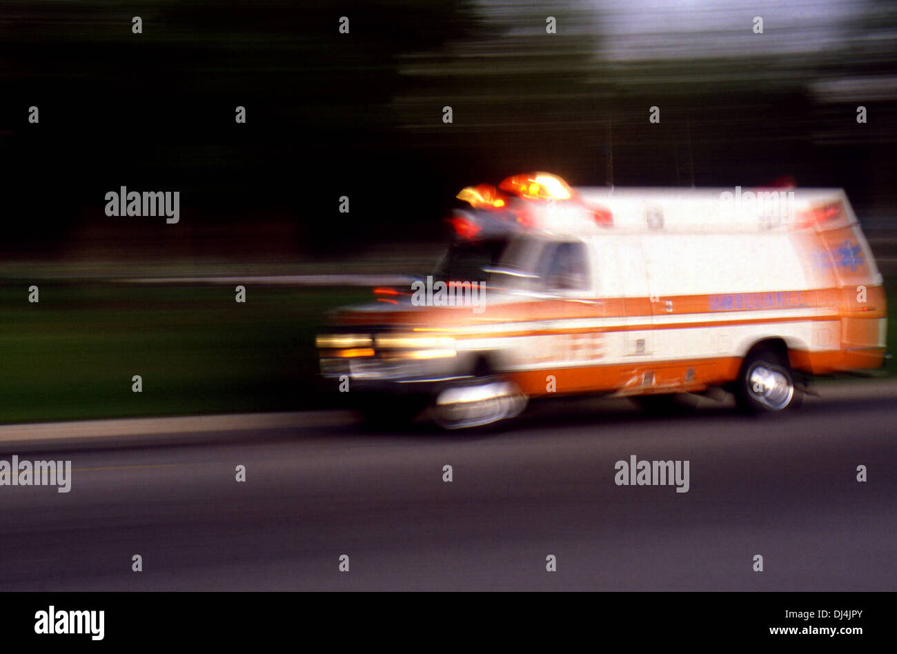 An ambulance rushing to the scene Stock Photo - Alamy