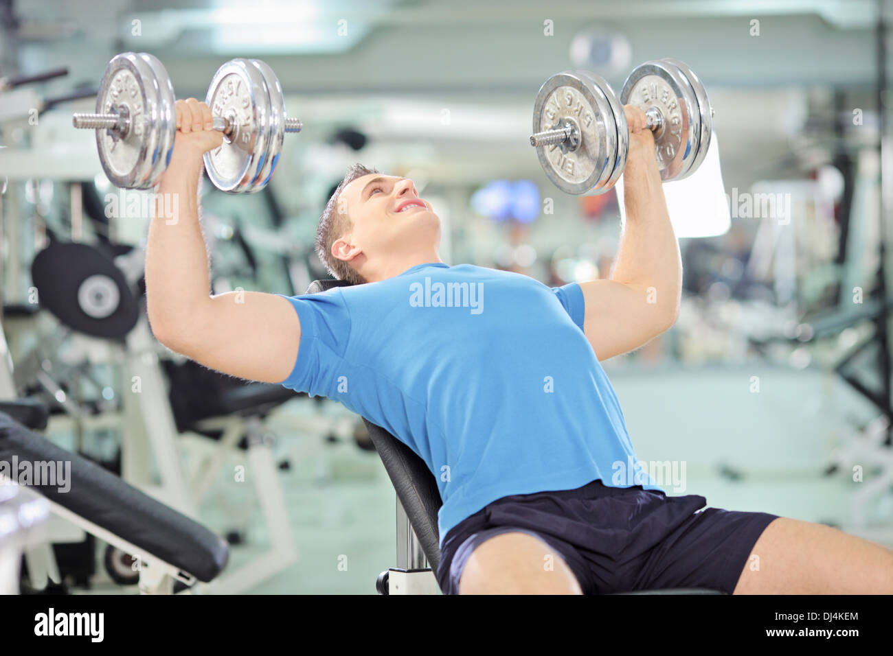 Man lifting weights in hi-res stock photography and images - Alamy