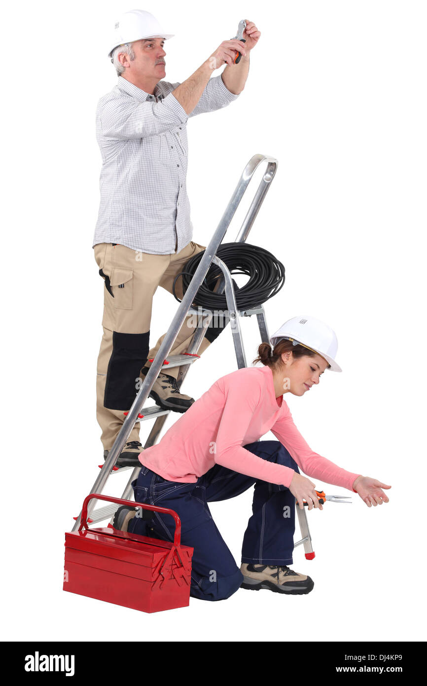Female construction worker learning Cut Out Stock Images & Pictures - Alamy