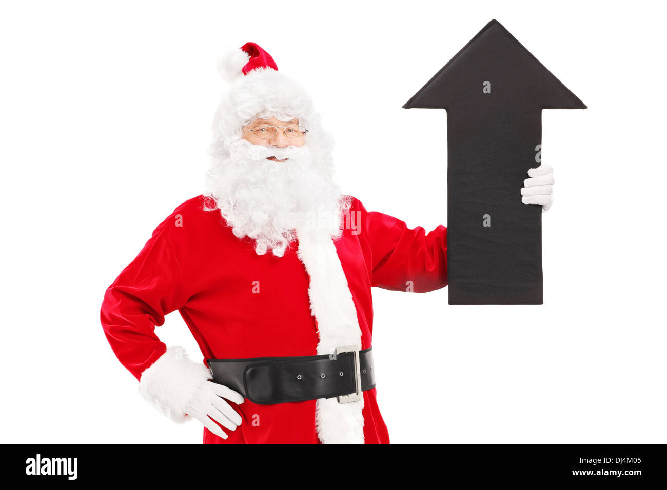 Smiling Santa Claus holding a big black arrow pointing up Stock Photo ...