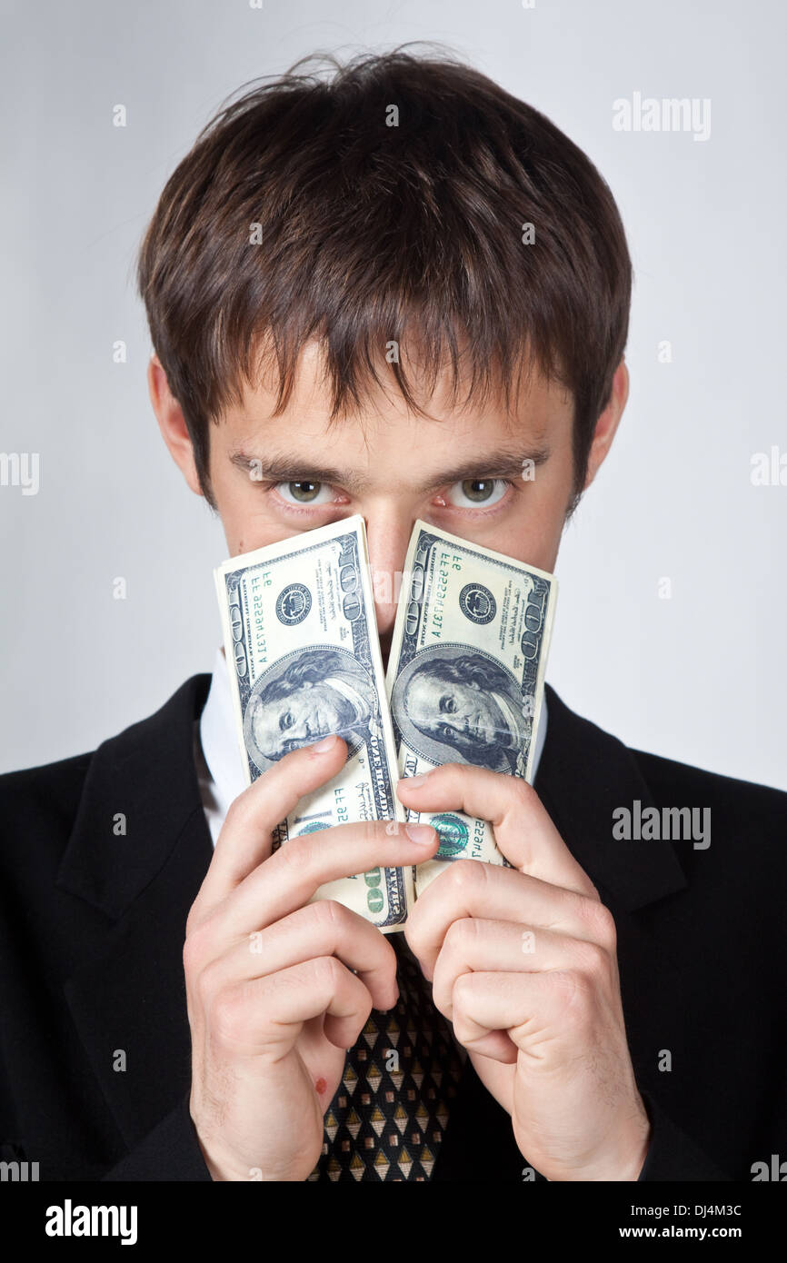 Man and money Stock Photo - Alamy