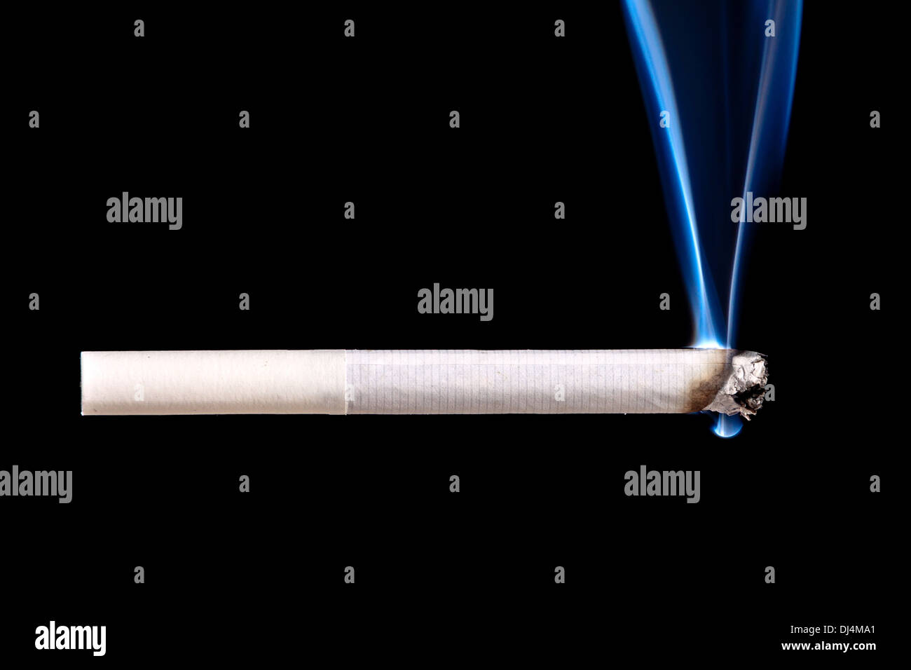 Smoking cigarette. Isolated on black Stock Photo - Alamy