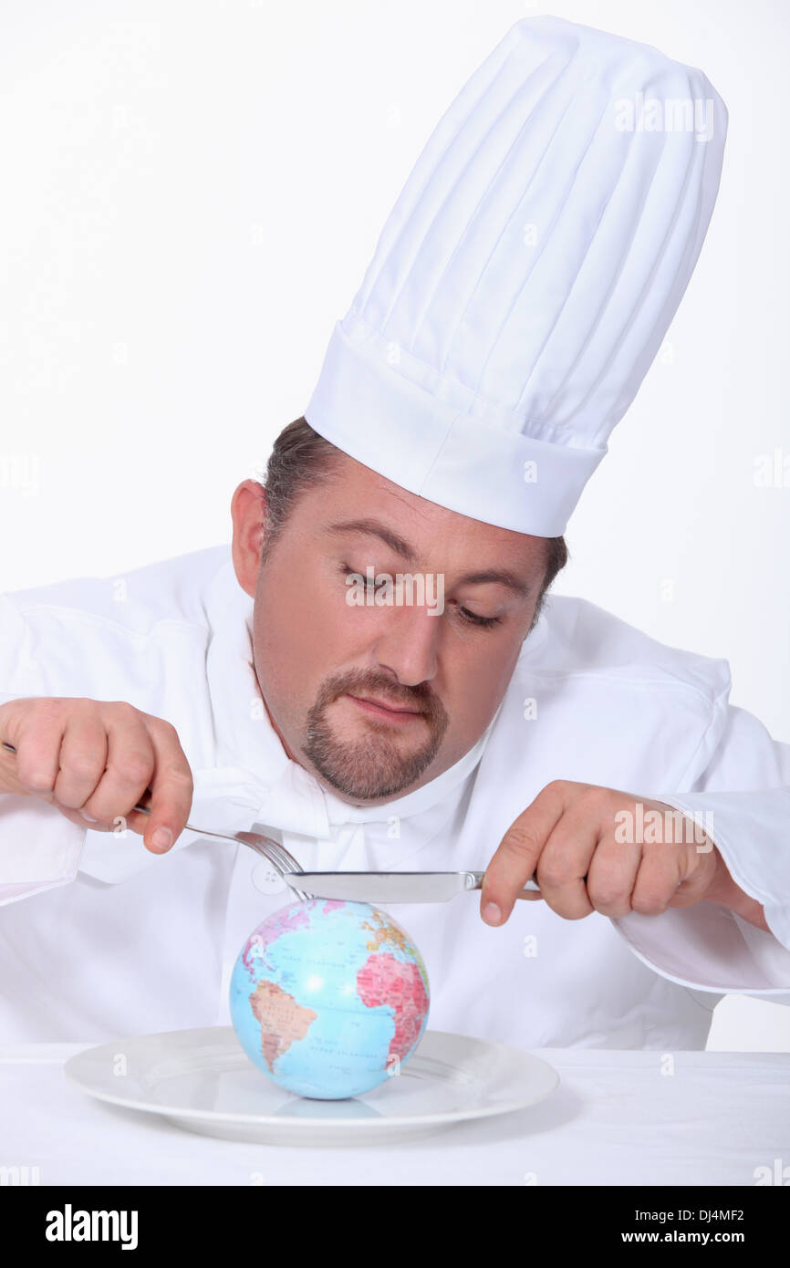 chef eating the globe Stock Photo - Alamy