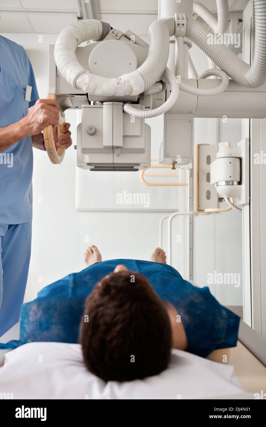Technician Taking Patient's X-ray Stock Photo - Alamy