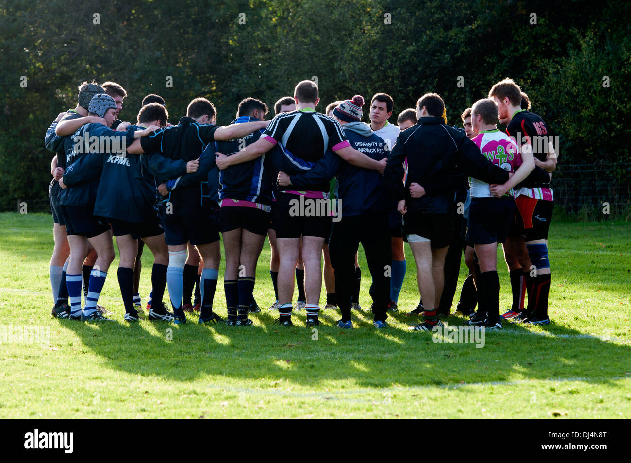 University sport, men`s Rugby Union, group huddle Stock Photo - Alamy