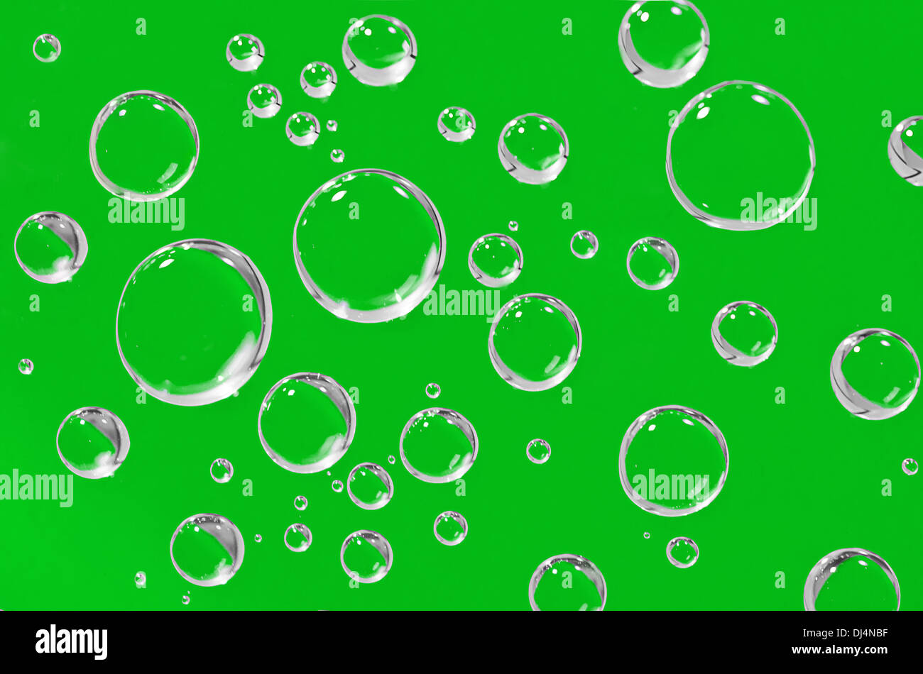 Water droplets on a green background Stock Photo - Alamy