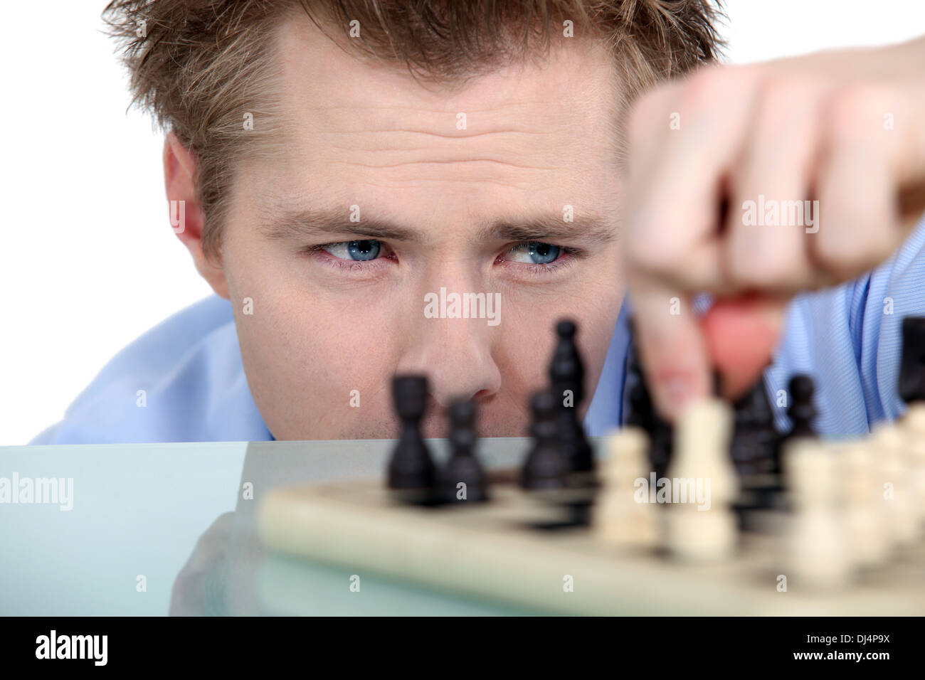 Player hand moving white queen hi-res stock photography and images - Alamy