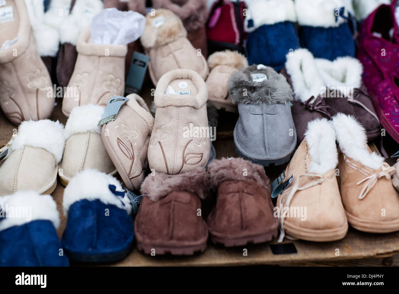 Display of shoes and slippers on a market stall Stock Photo - Alamy