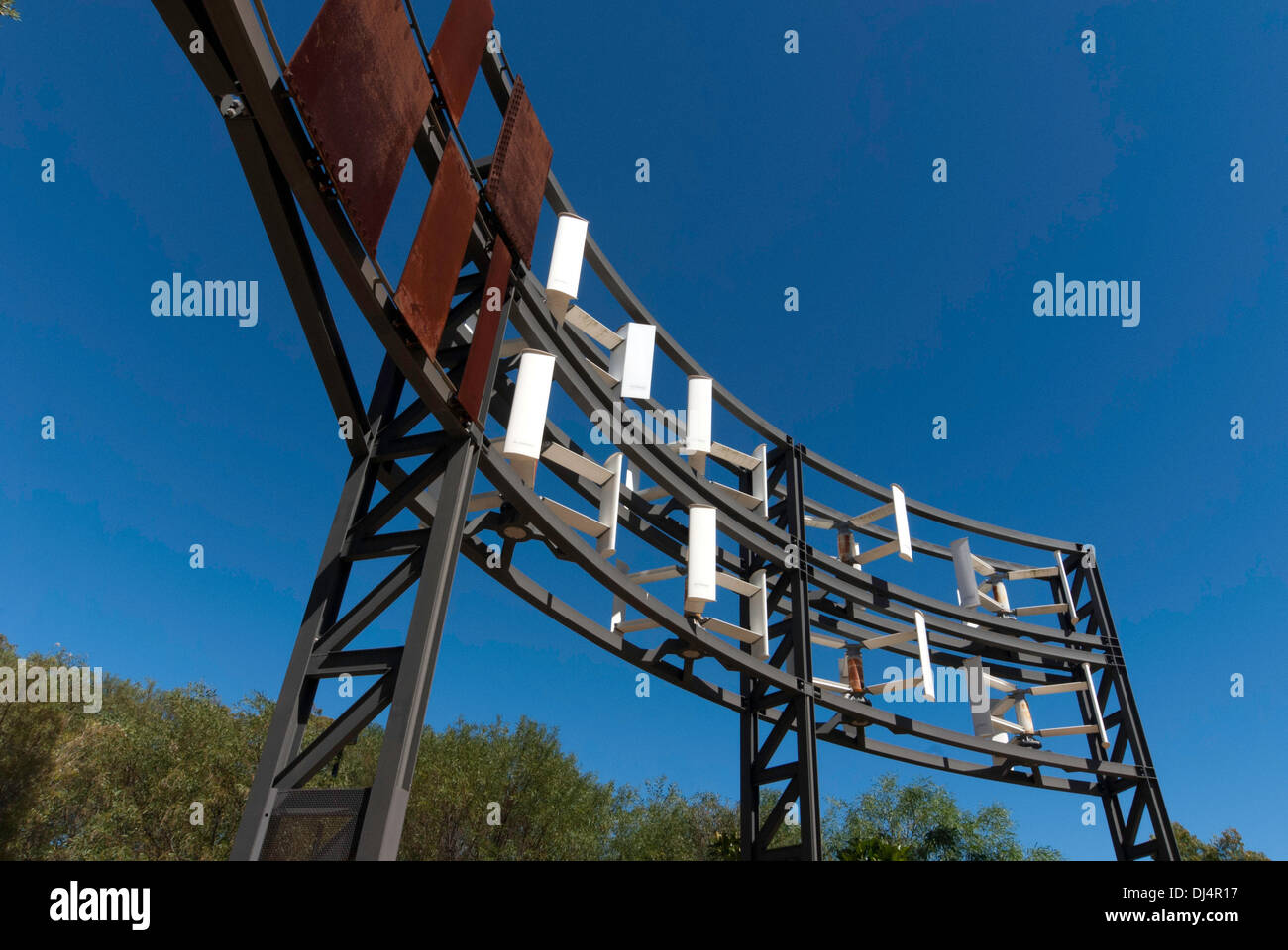 Detail of Tank 101 at Ballast Point Park, showing eight wind turbines ...
