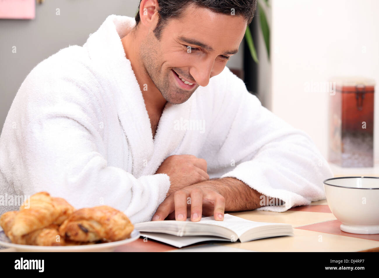Man reading a book Stock Photo - Alamy