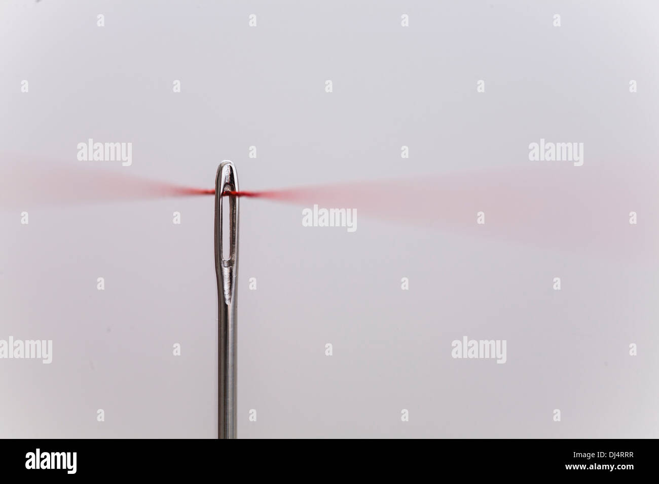 Needle and a thread hi-res stock photography and images - Alamy