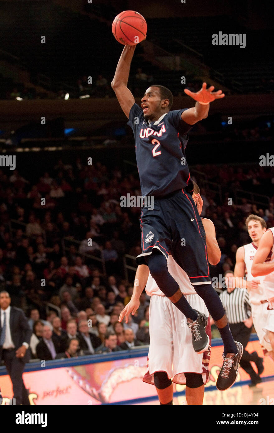 New York, New York, USA. 21st Nov, 2013. UConn's forward DeAndre Daniels (2) sky dunks in the ...