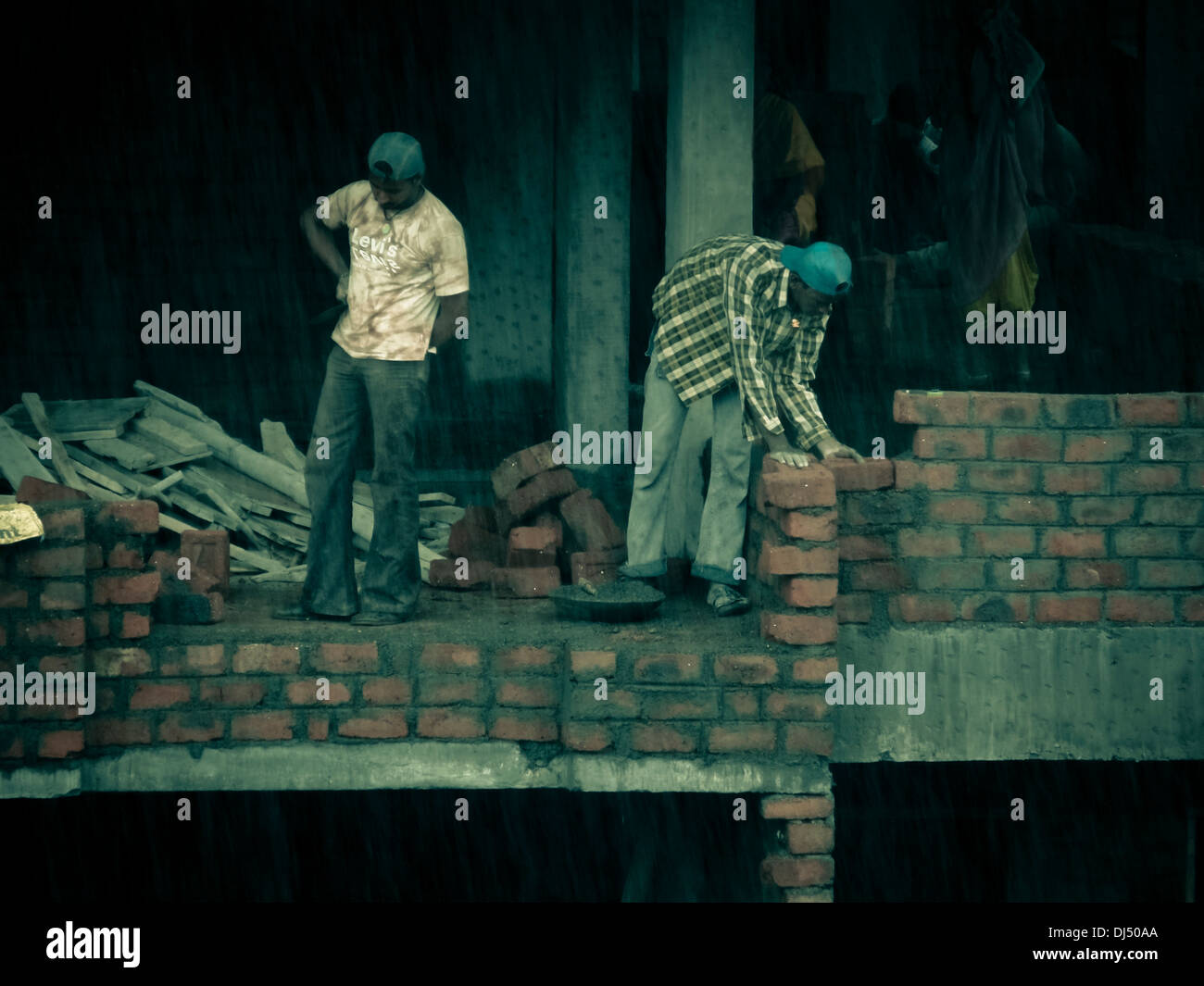 Workers are working on building under construction Stock Photo - Alamy