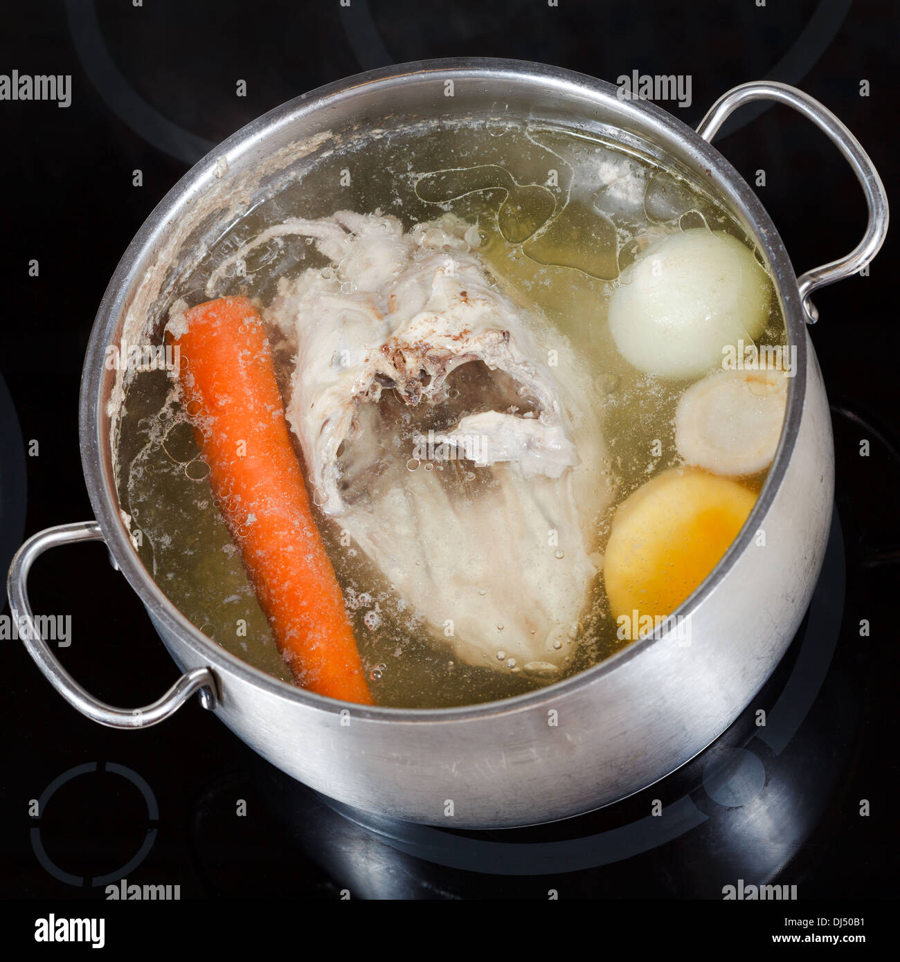 Chicken broth pot stove hi-res stock photography and images - Alamy