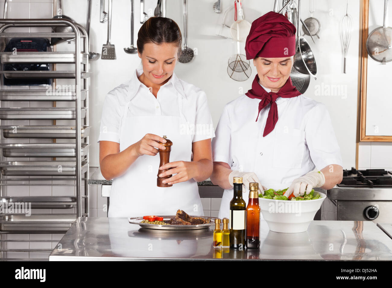 Female Chefs Preparing Food Stock Photo - Alamy