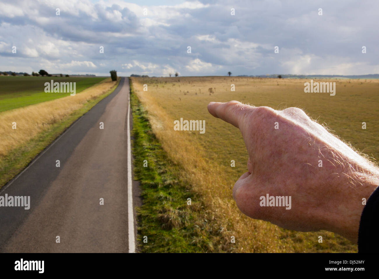 Hand pointing direction this way hi-res stock photography and images ...