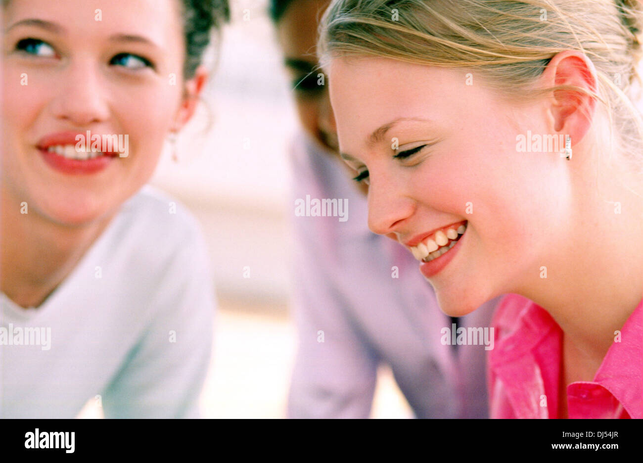 Smiling faces of teenage girls Stock Photo - Alamy