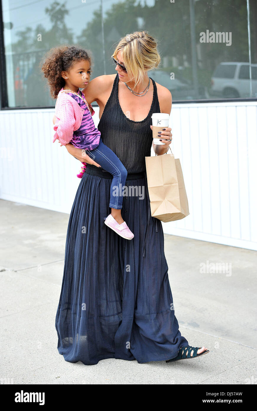 Heidi klum and lou sulola samuel hi-res stock photography and images ...