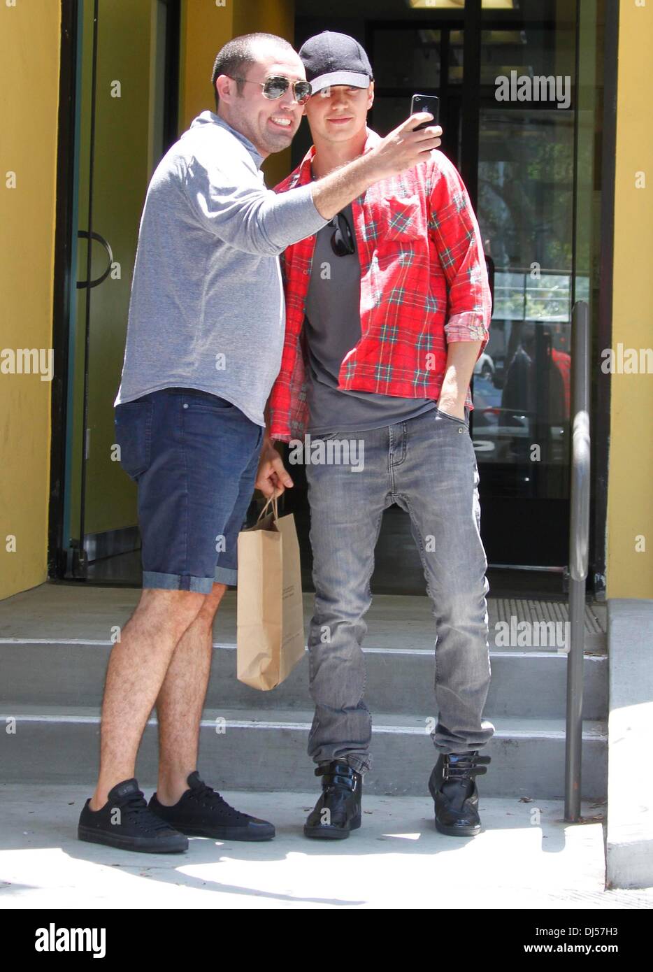Hayden Christensen poses for a picture with a fan whilst out in West ...